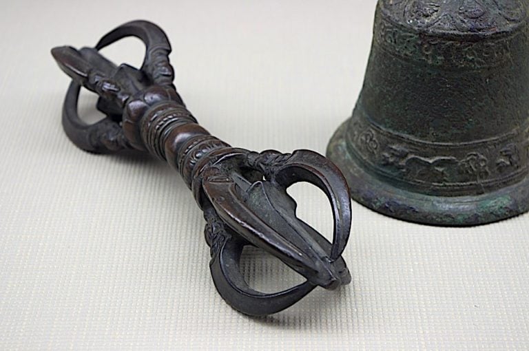 Why do Vajrayana Buddhists always symbolically carry a bell and vajra ...